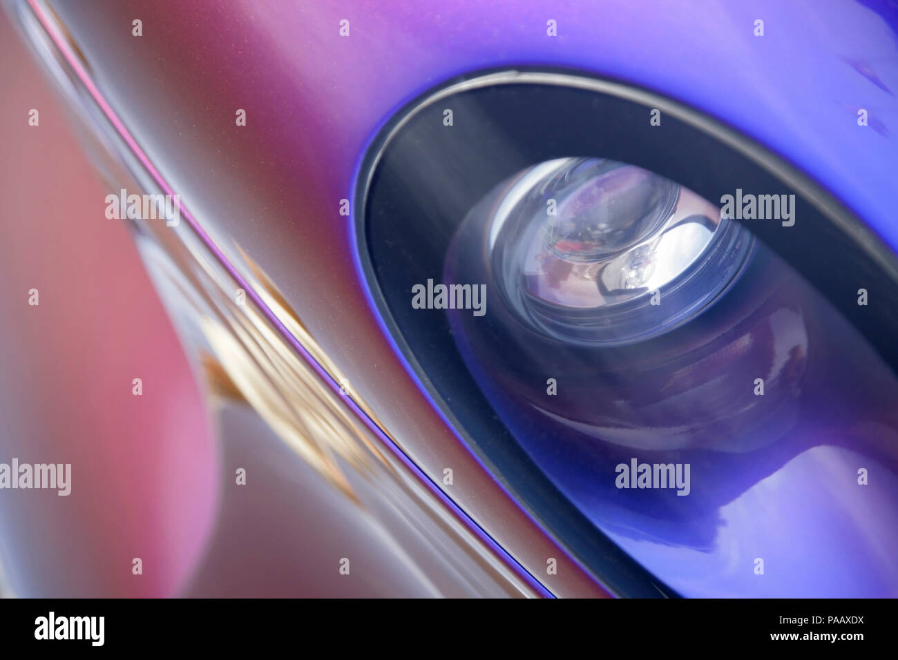 Headlight of metallic blue / purple TVR Tuscan sportscar Stock Photo ...