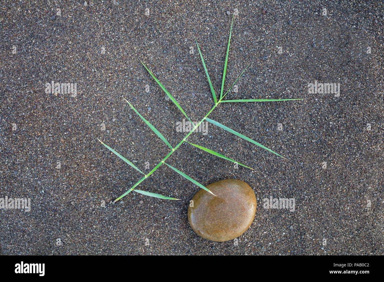 Pile of pebbles on sand hi-res stock photography and images - Alamy