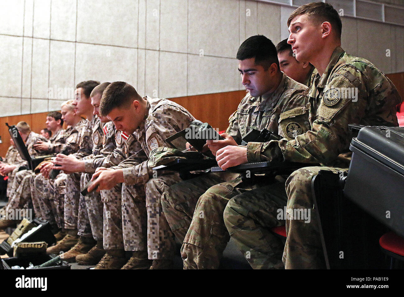 Pfc. Justin Giaimo (right), and Spc. Fortino Licea (second on right ...