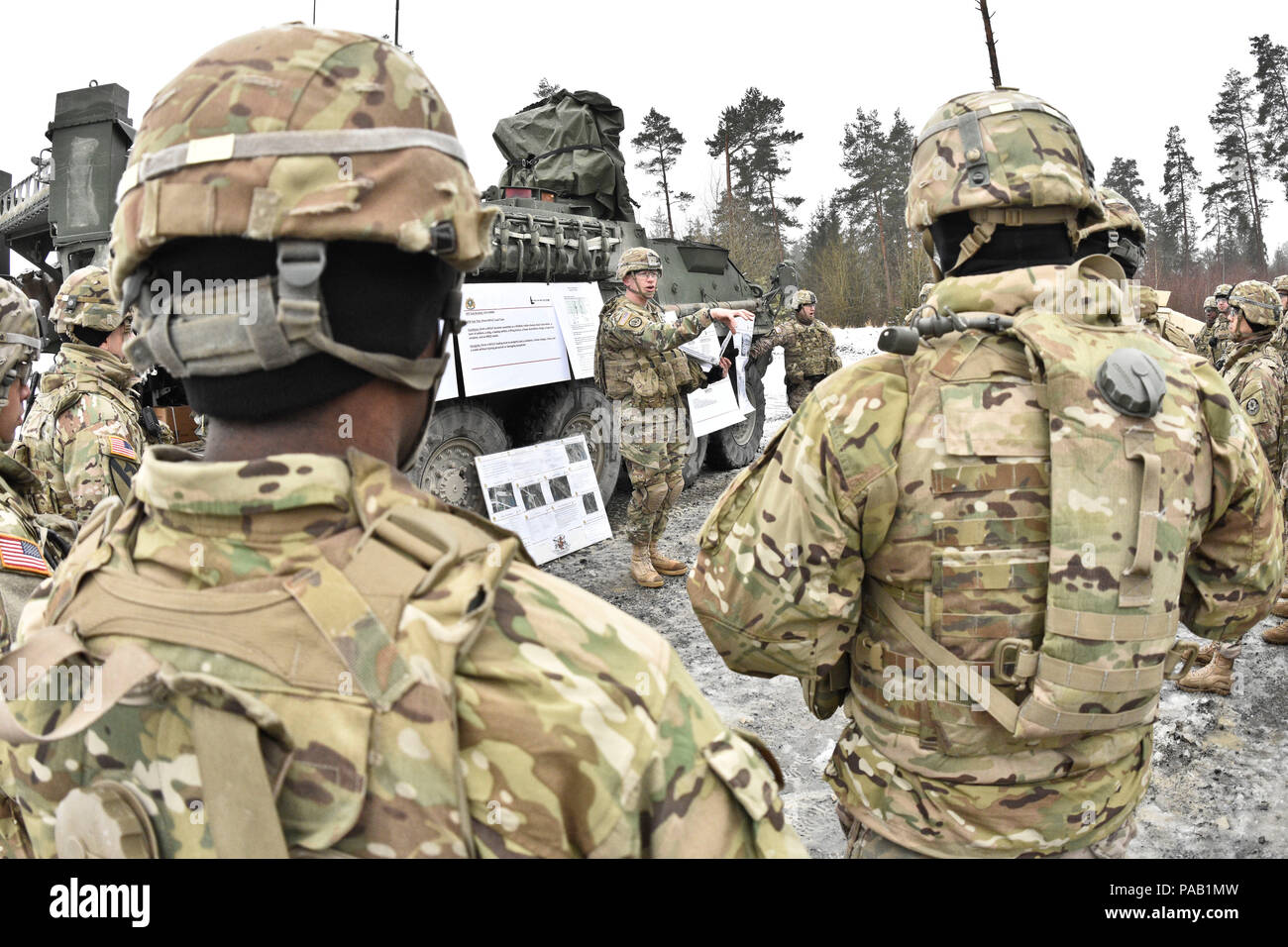 Sgt. 1st Class Roger Lewis (right), a platoon sergeant assigned to 2nd ...