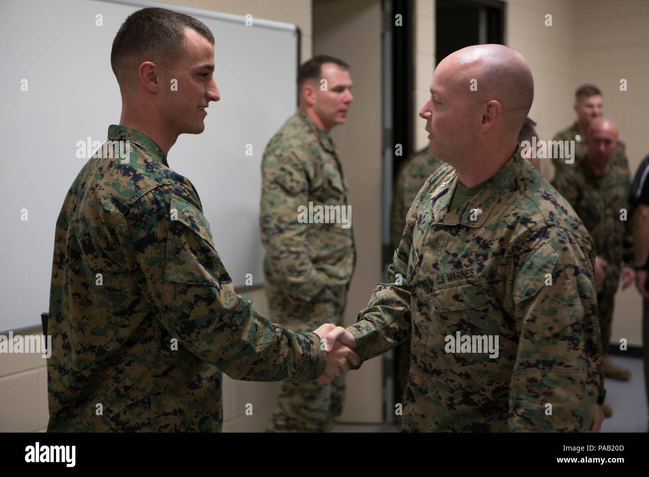 U.S. Marine Corps Staff Sgt. Jonathon D. Manuel (left), a Combat ...