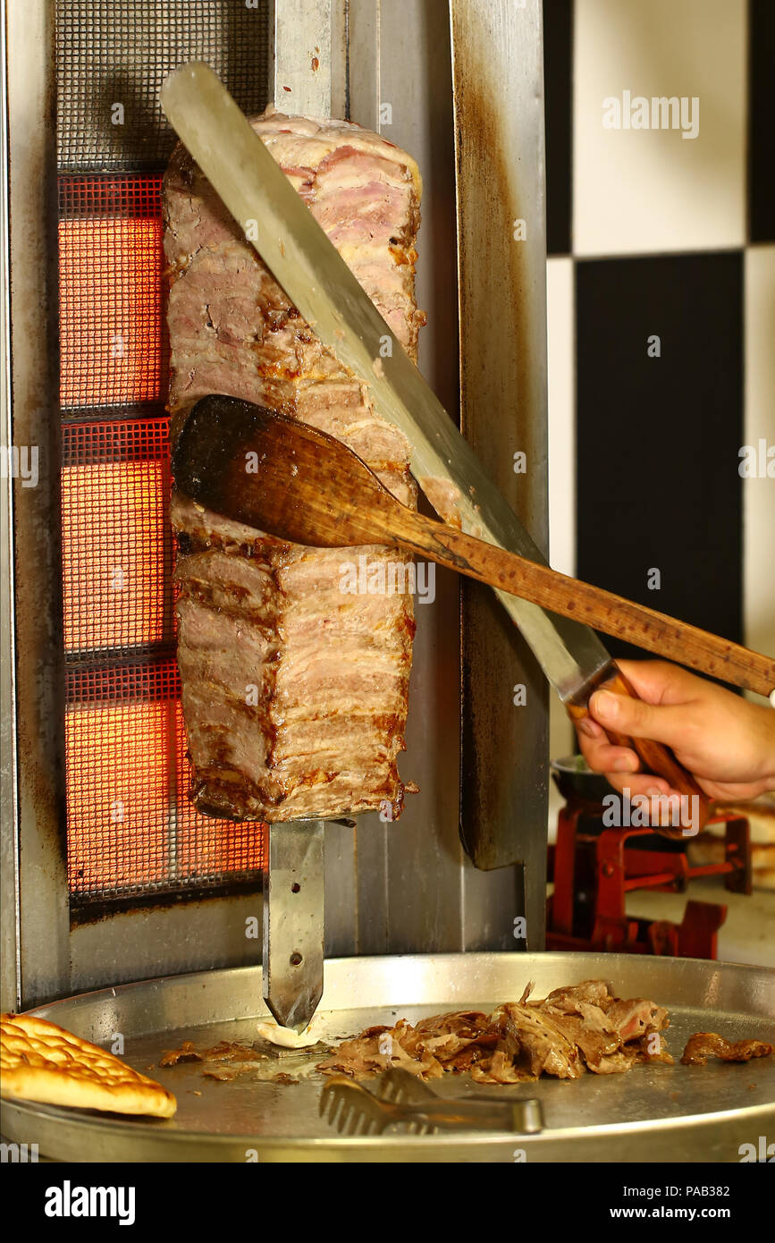 Meat doner kebab grilled meat and vegetables on plate Stock Photo - Alamy