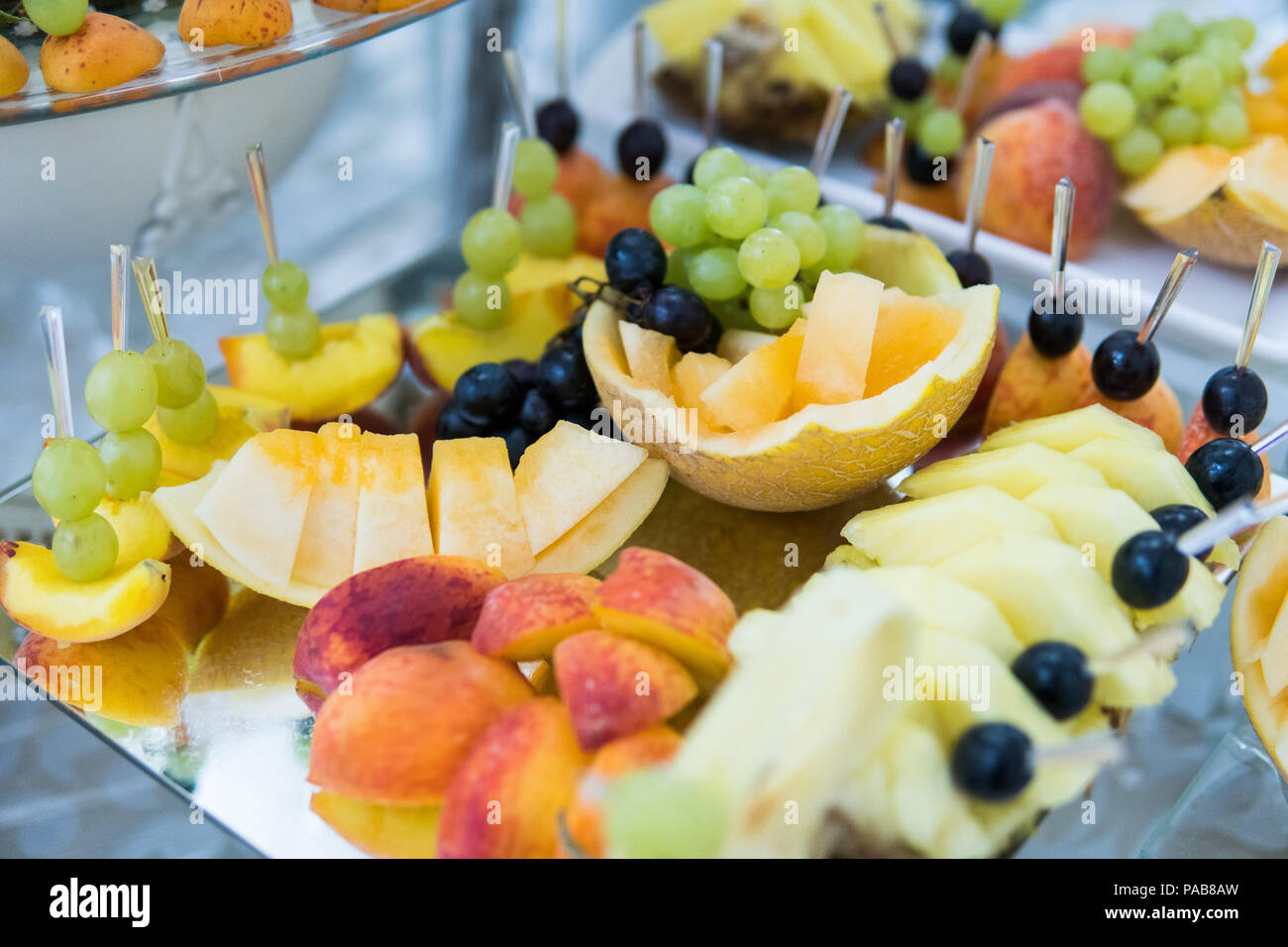Feautiful fruit buffet served for guests at wedding Stock Photo - Alamy
