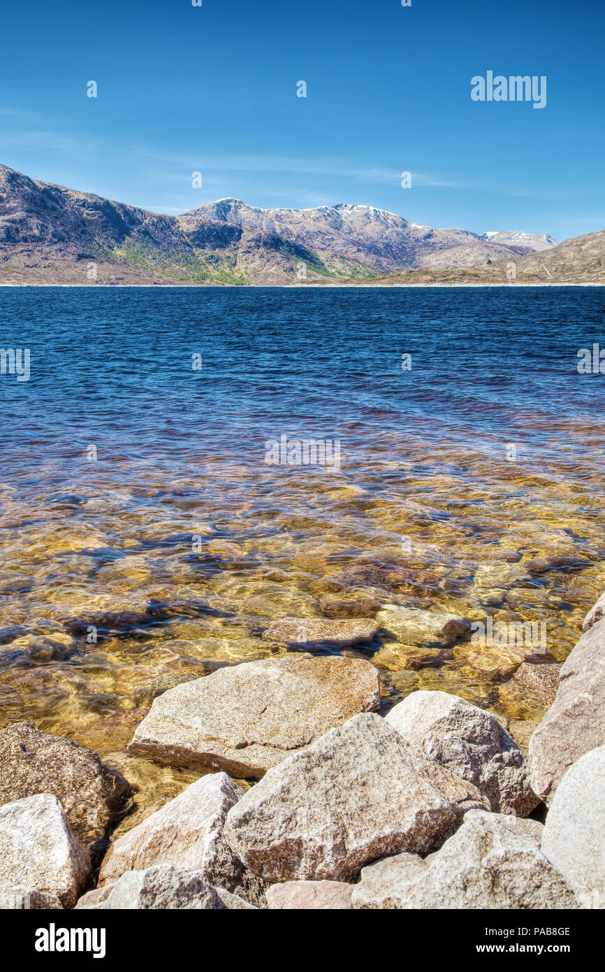 A photography of a typical scottish lake Stock Photo - Alamy