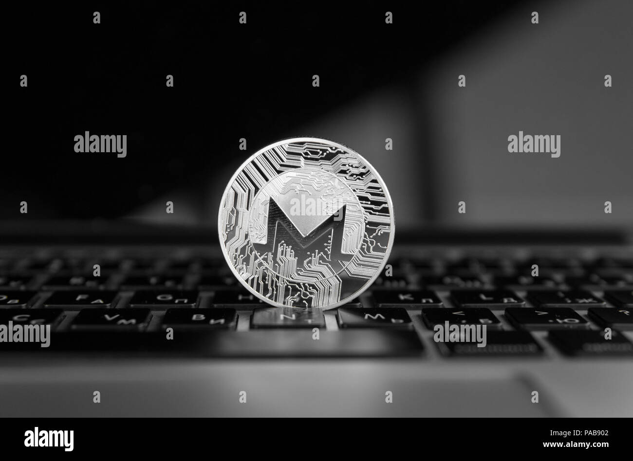 Monero coin symbol on laptop, future concept financial currency, crypto ...