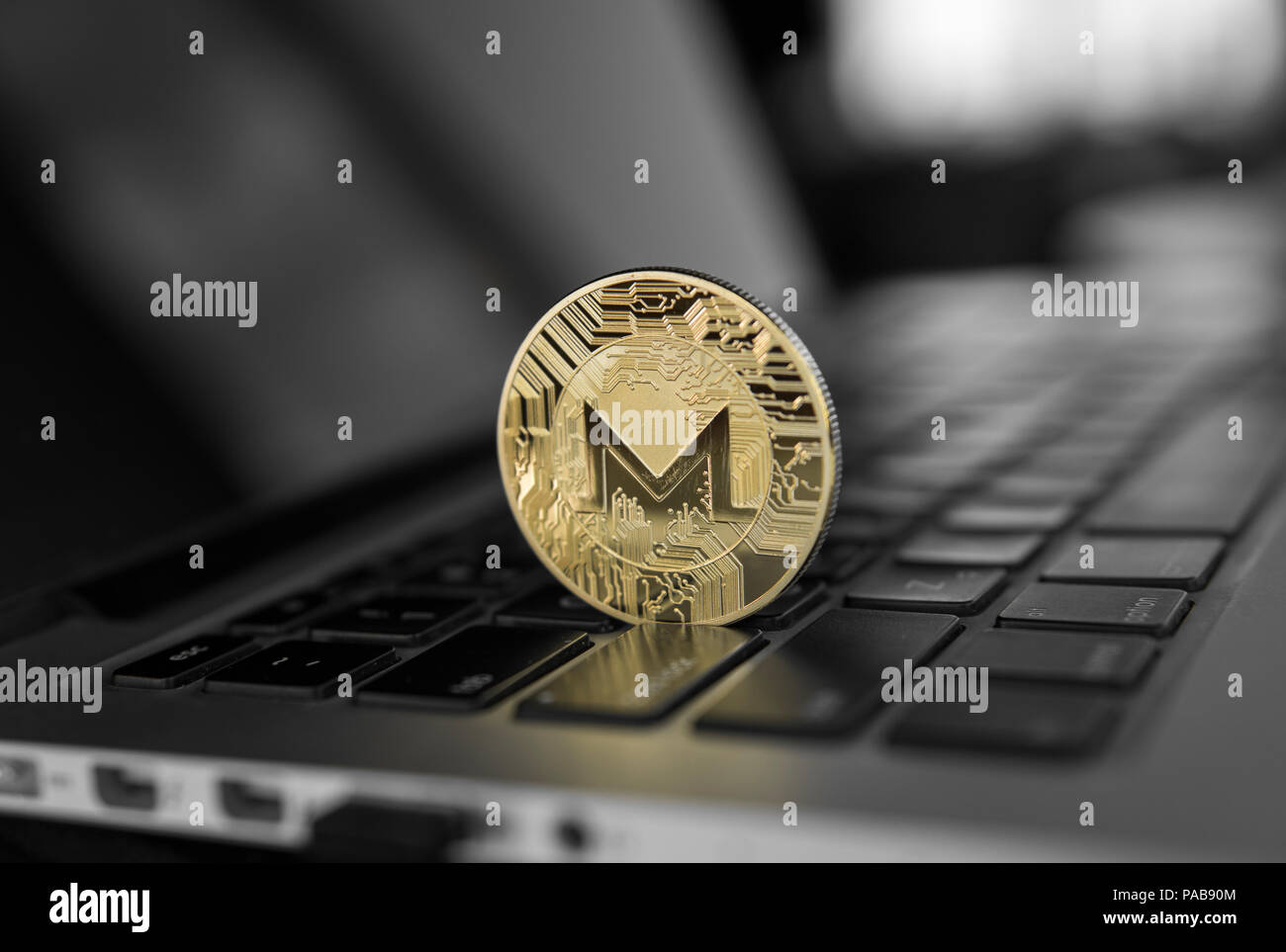 Monero coin symbol on laptop, future concept financial currency, crypto ...