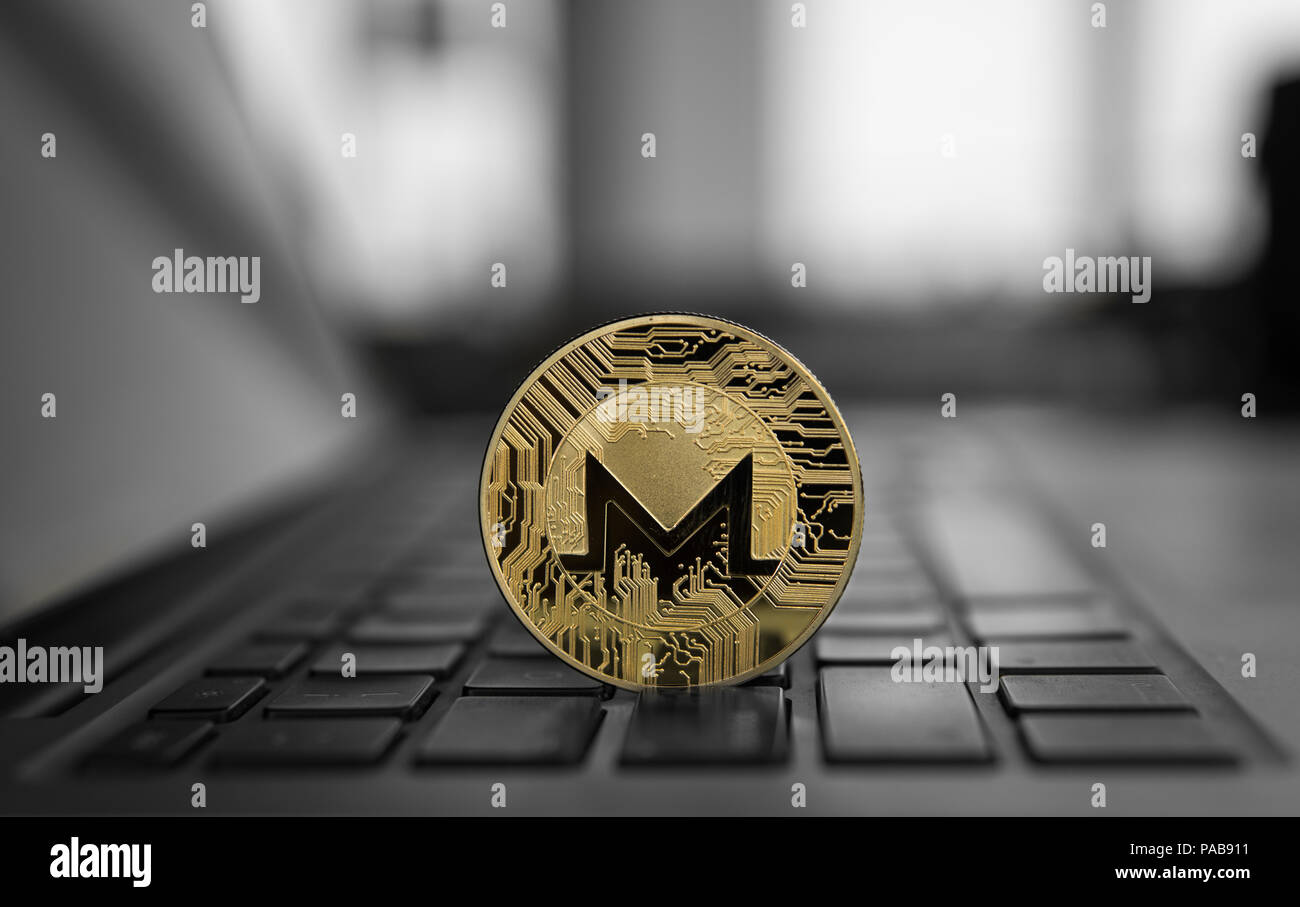 Monero coin symbol on laptop, future concept financial currency, crypto ...