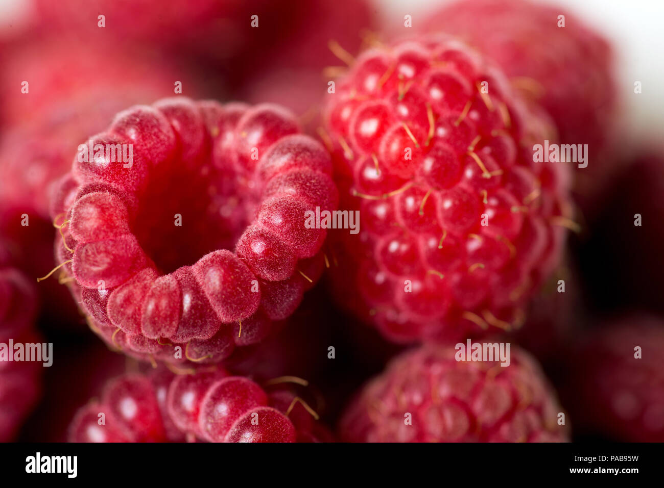 Raspberry fruit background Stock Photo - Alamy