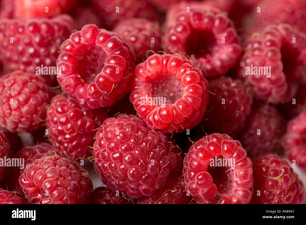 Raspberry fruit background Stock Photo - Alamy