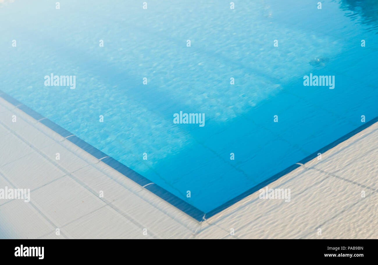 Outdoor sunny swimming pool with a beautifull clean blue water Stock ...