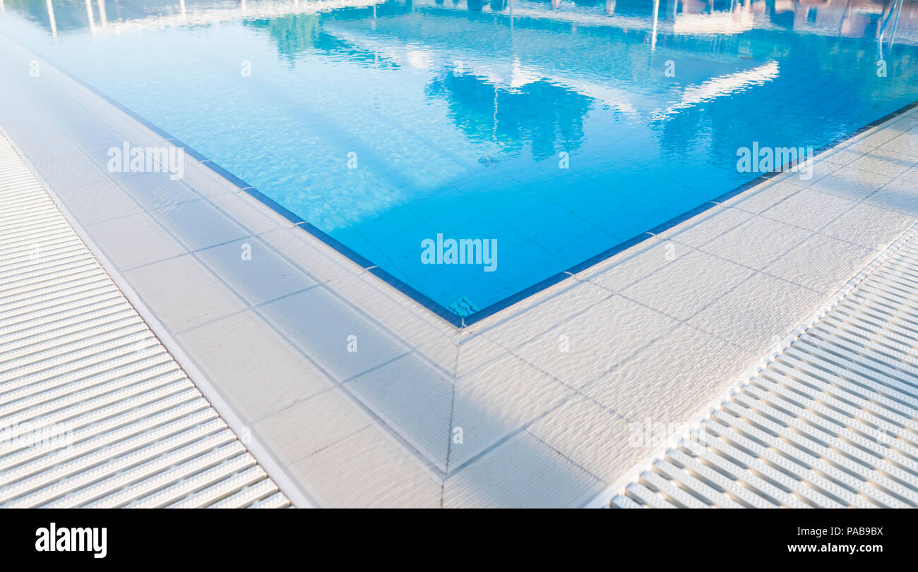 Outdoor sunny swimming pool with a beautifull clean blue water Stock ...