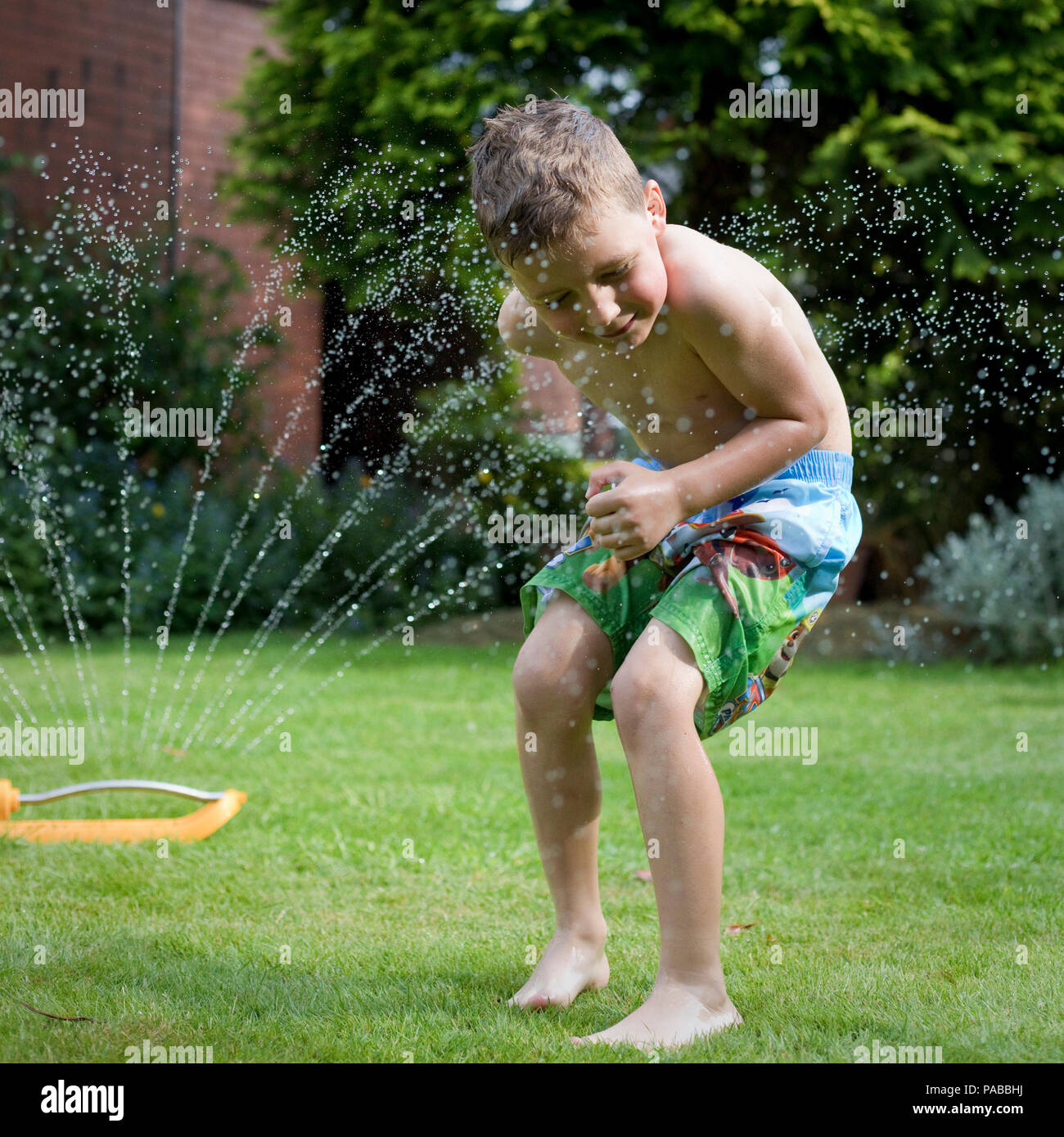 Soaking wet boy hi-res stock photography and images - Alamy