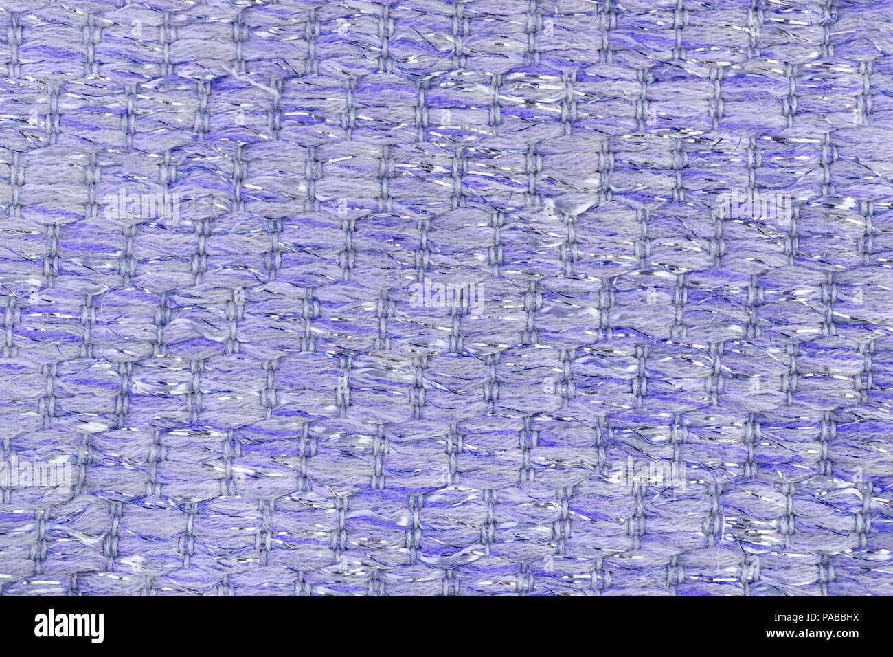 Blue handmade tweed with lurex with lurex shiny fiber texture closeup ...