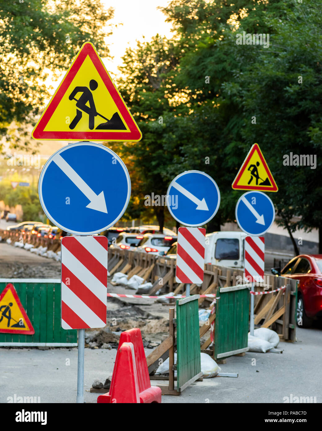 Man digging road work sign hi-res stock photography and images - Alamy