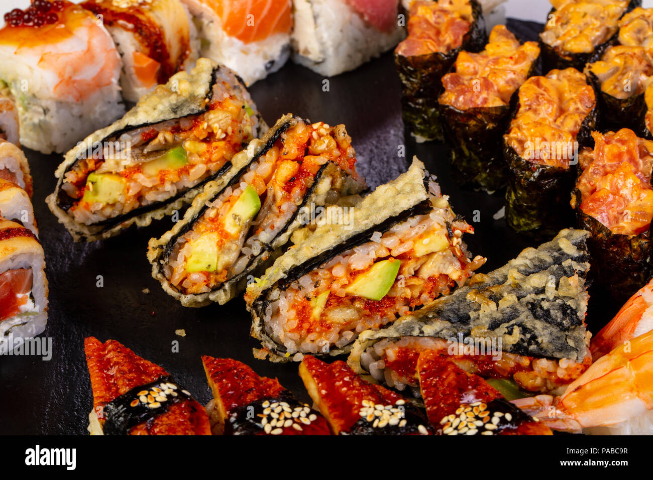 Sushi and rolls mix plate assortment set Stock Photo - Alamy