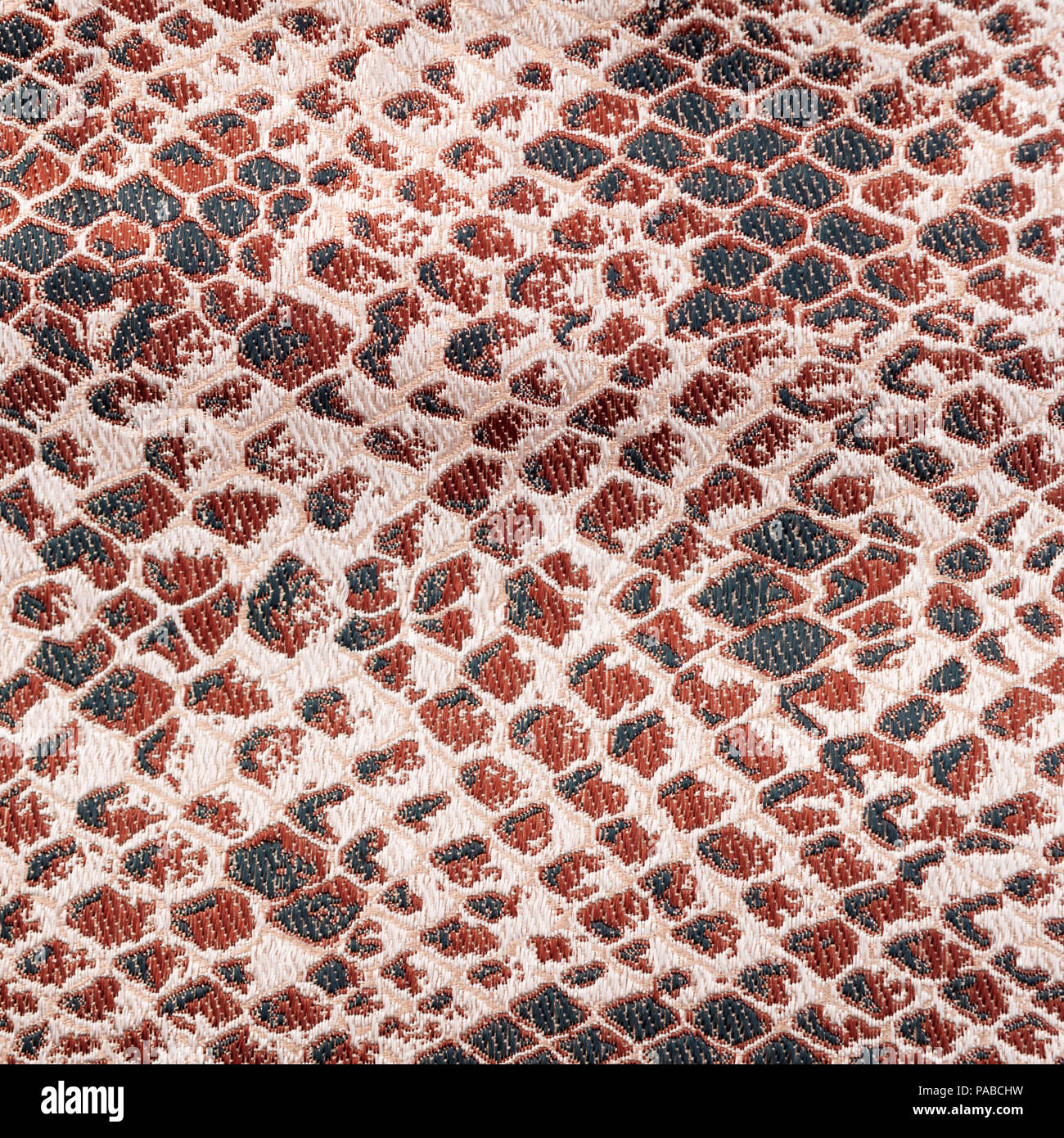 Jacquard weave selfrule texture of red snake skin Stock Photo - Alamy