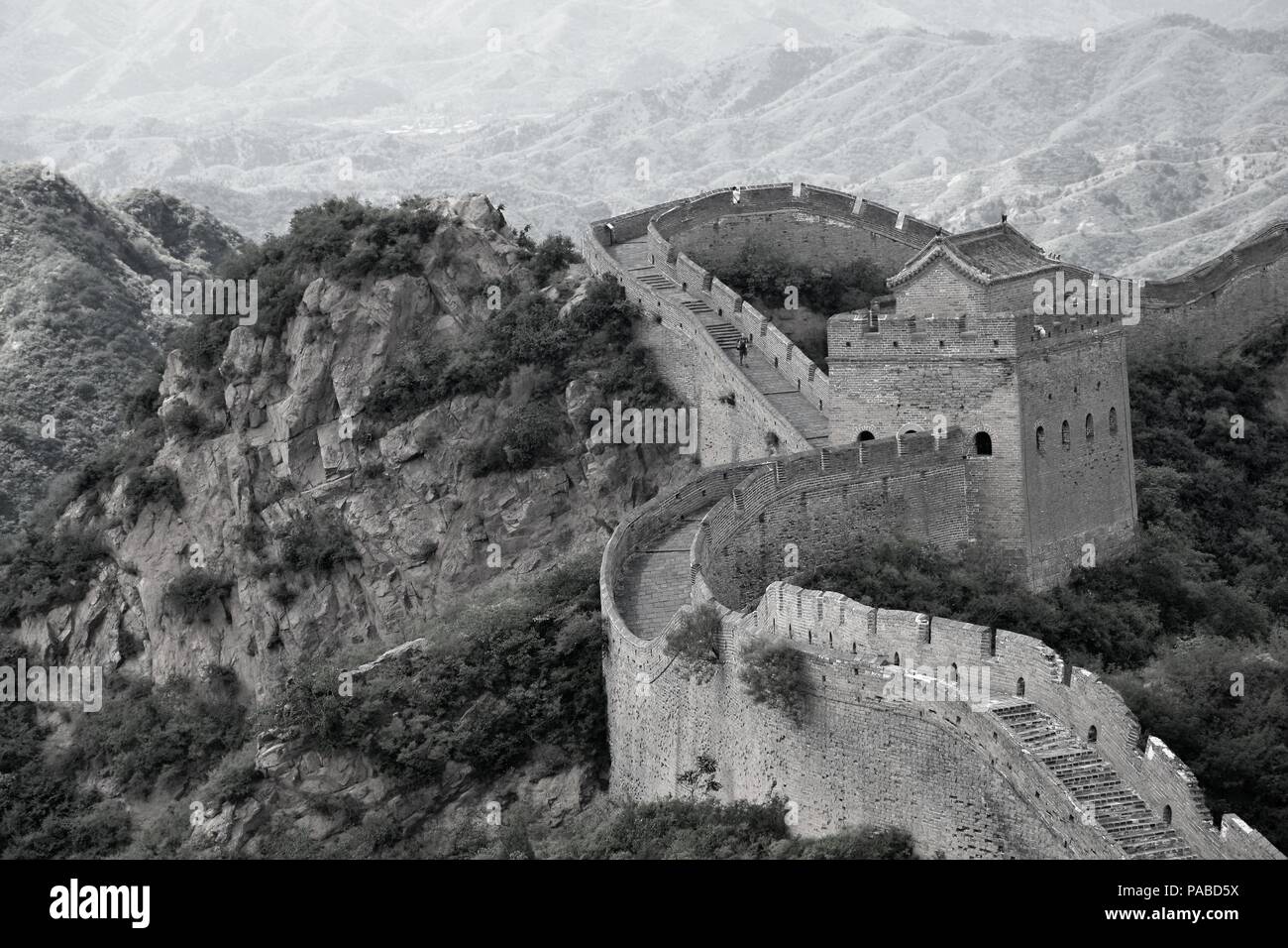 The black and white Chinese Great Wall and its watchtower, section near ...