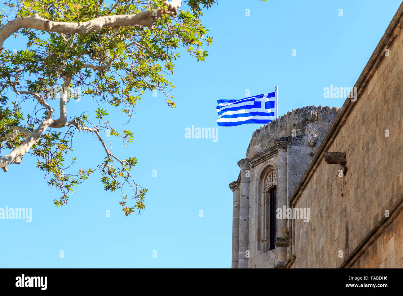 Greek flag on archaeological museum's top in Rhodes, Dodecanese, Greece ...