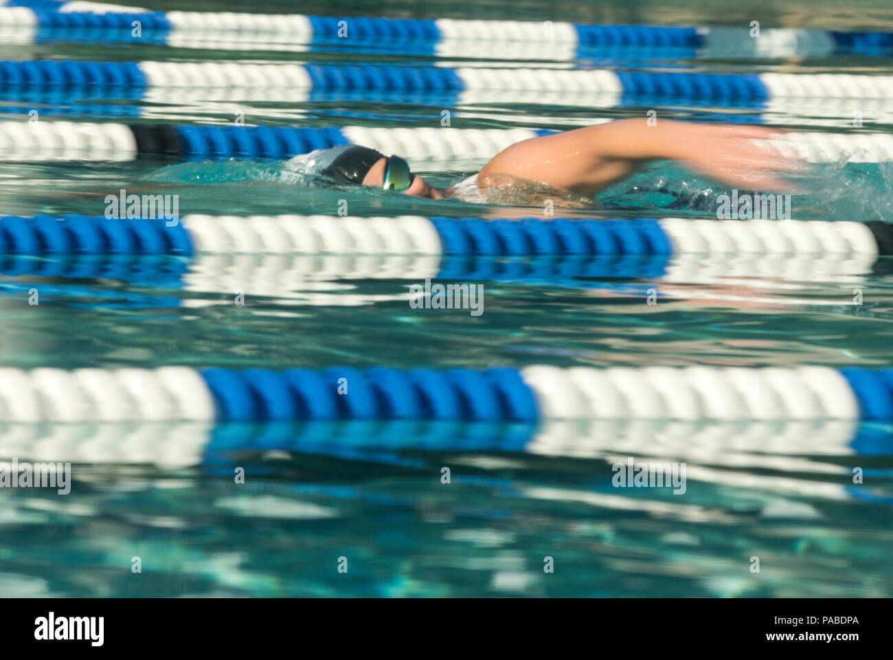 Man swimming in a pool Stock Photo - Alamy