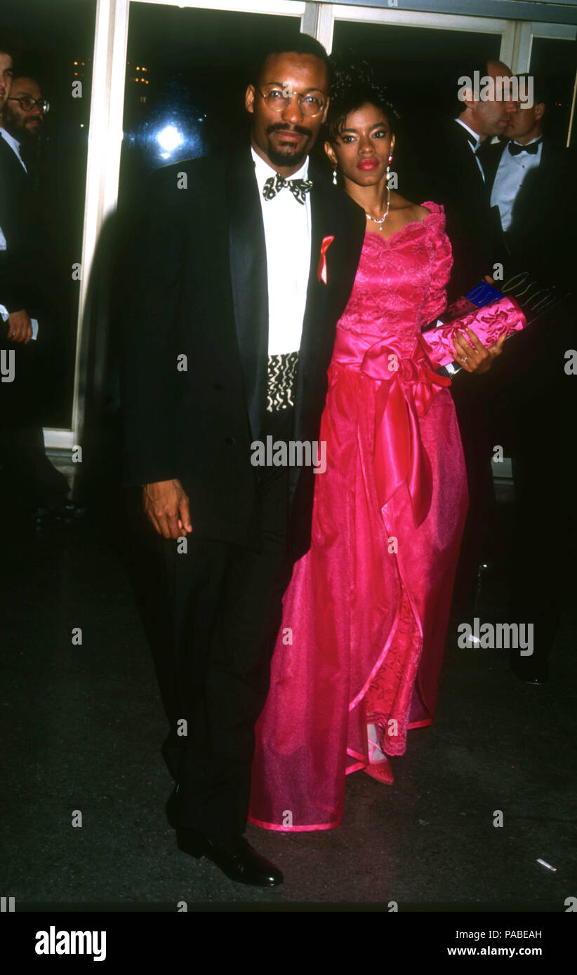 LOS ANGELES, CA - MARCH 30: Director John Singleton and Tasha Lewis ...