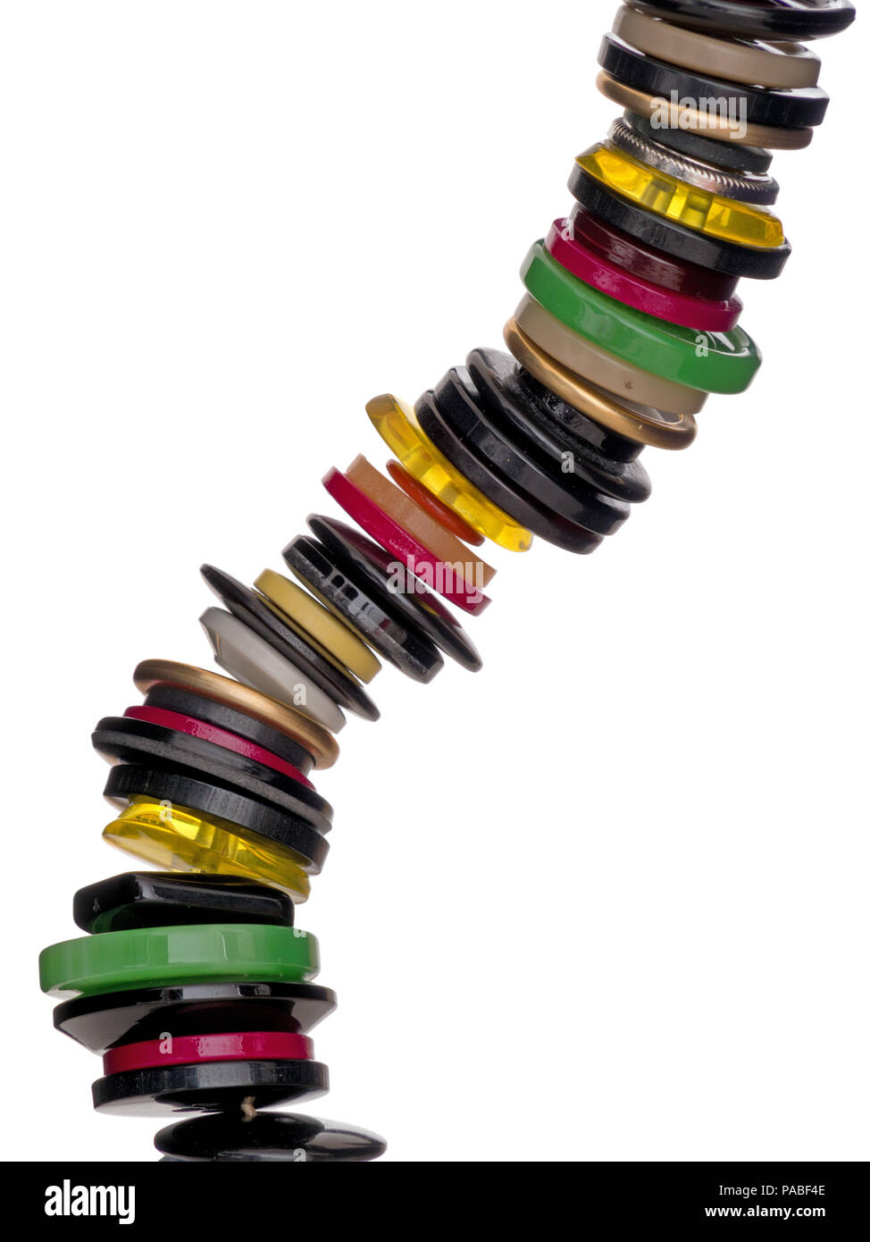 Old buttons kept on string, isolated on white background. Habderdashery ...