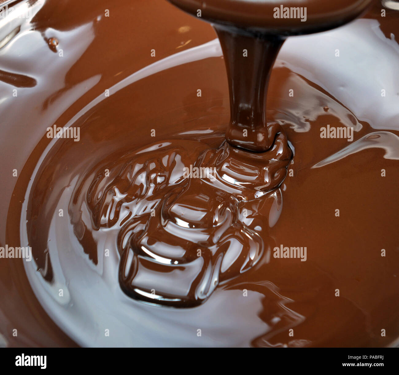 lots of chocolate falling from above Stock Photo - Alamy