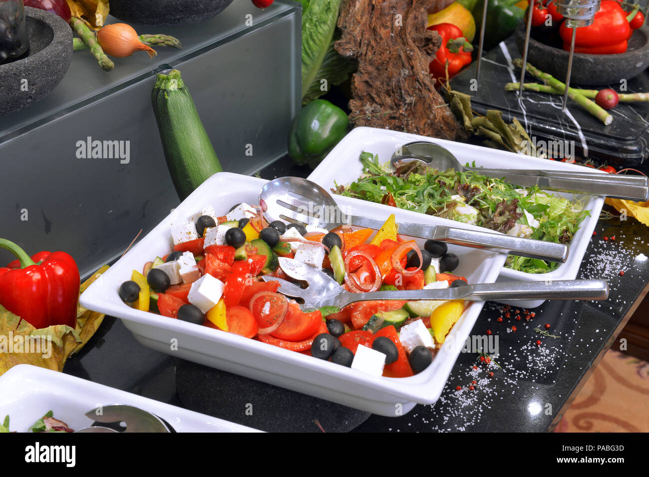Greek salad on a buffet table. Smorgasbord Stock Photo - Alamy
