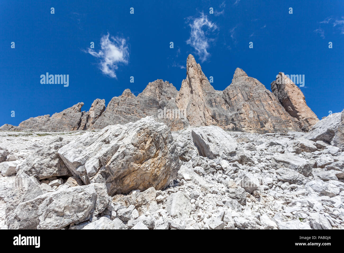 Large blocks of rock at the foot of beautiful dolomitic pinnacles, Tre ...