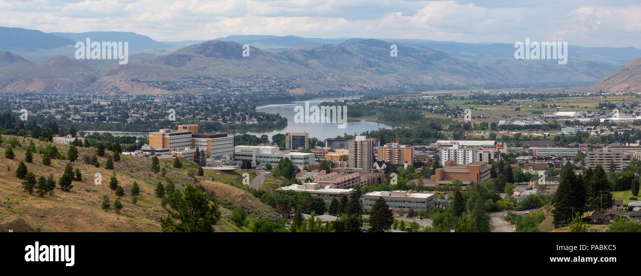 Aerial panoramic view of Kamloops City during a cloudy summer day ...