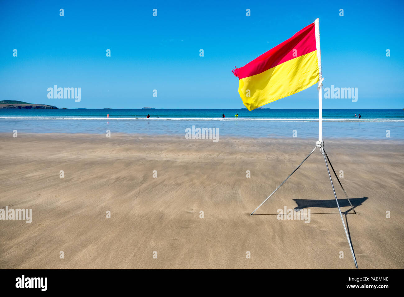Lifeguard's safe bathing flag on Whitesands Beach in the Pembrokeshire ...