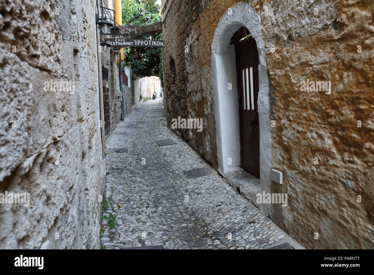 A look through one of the many narrow passages in the picturesque old ...