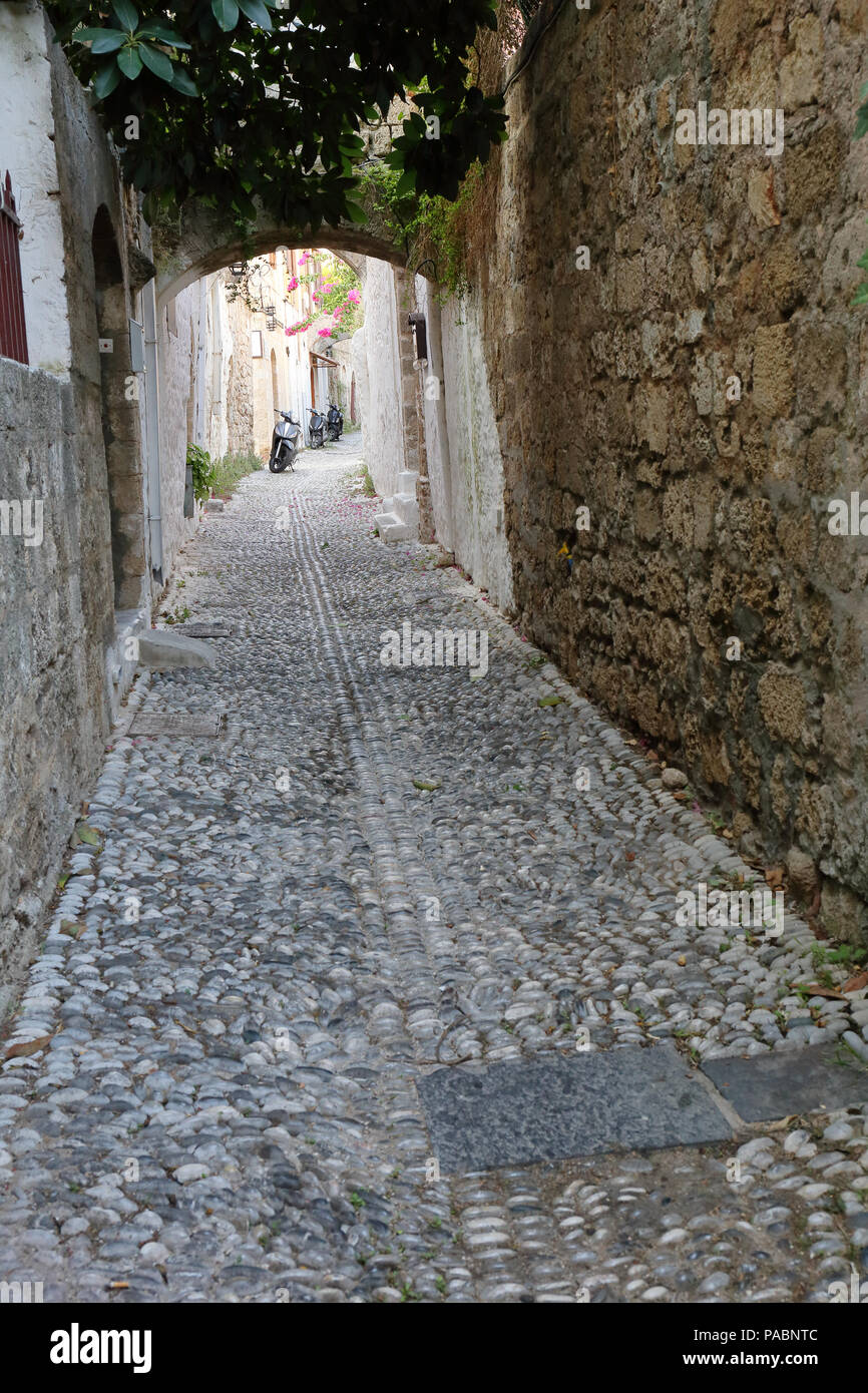 A look through one of the many narrow passages in the picturesque old ...