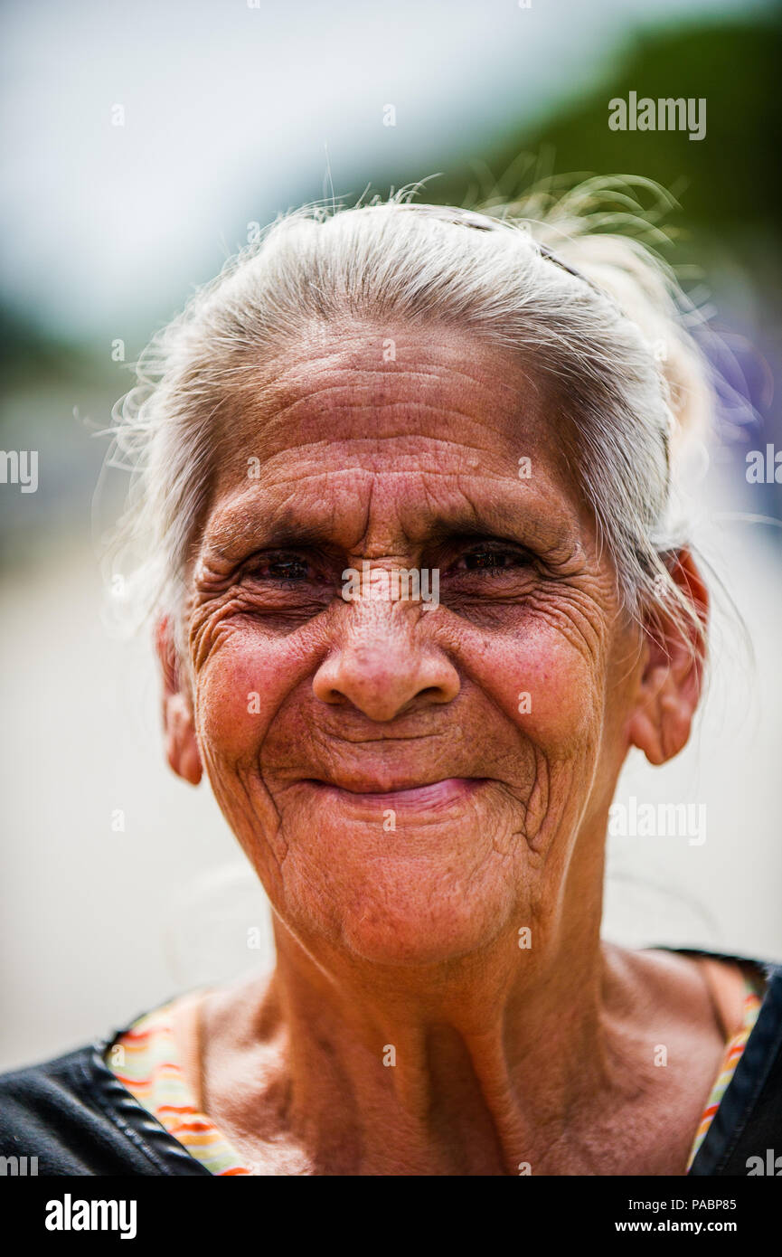 SAN JOSE, COSTA RICA - JAN 6, 2012: Unidentified Costa Rican smiling ...