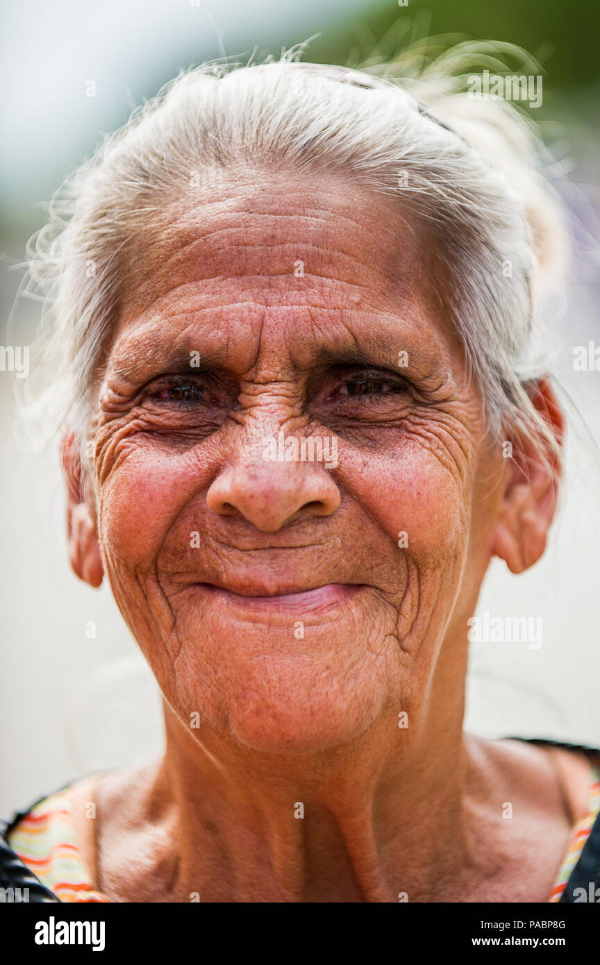 SAN JOSE, COSTA RICA - JAN 6, 2012: Unidentified Costa Rican smiling ...