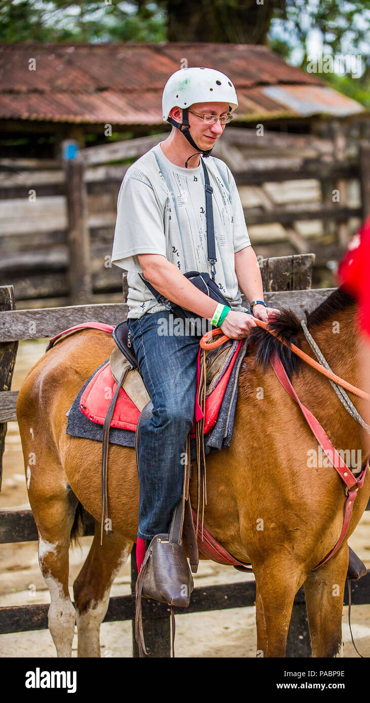 SAN JOSE, COSTA RICA - JAN 6, 2012: Unidentified Costa Rican man on a ...