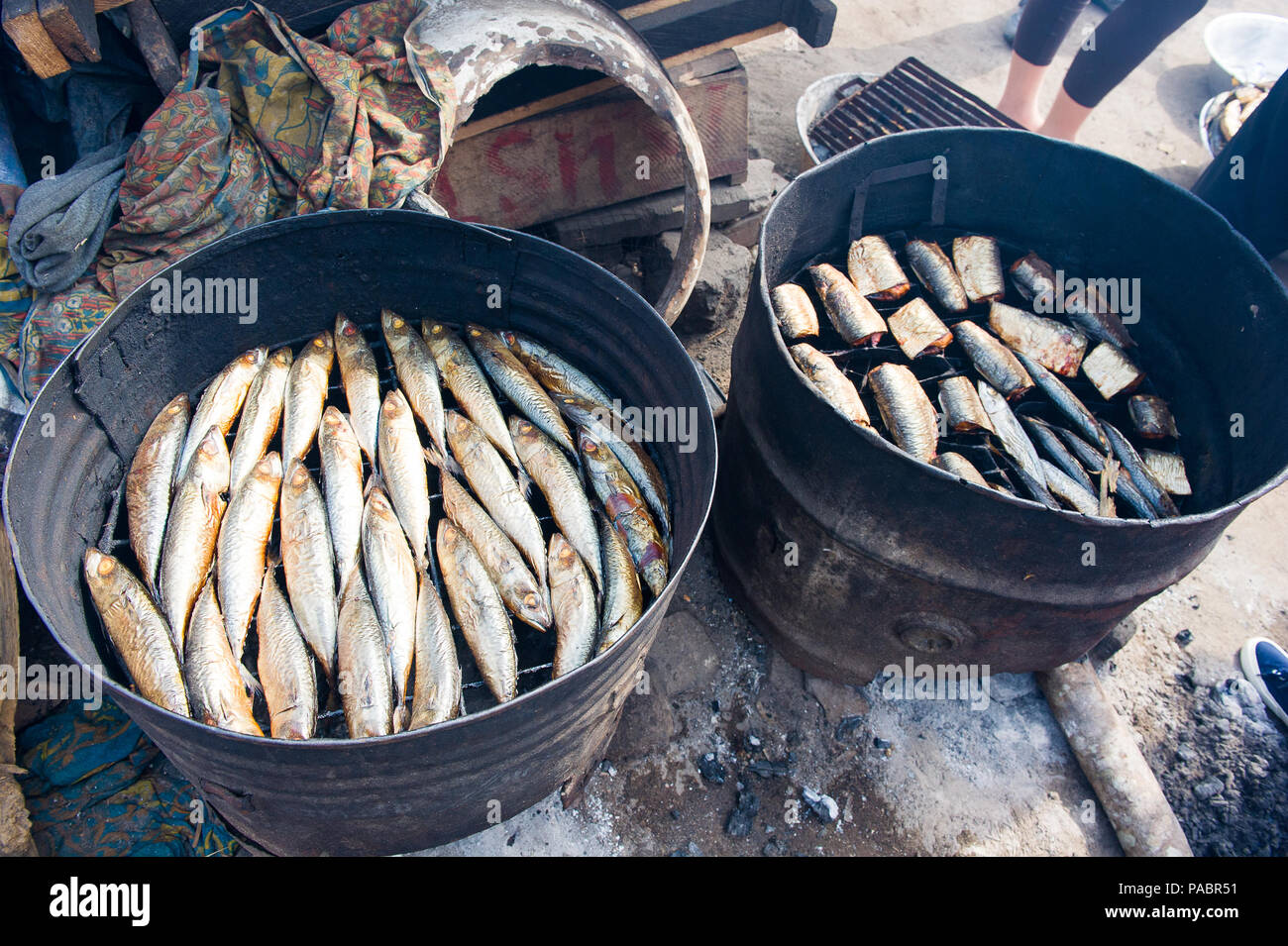 GHANA - MARCH 2, 2012: Fish market in Ghana, on March 2nd, 2012. People ...