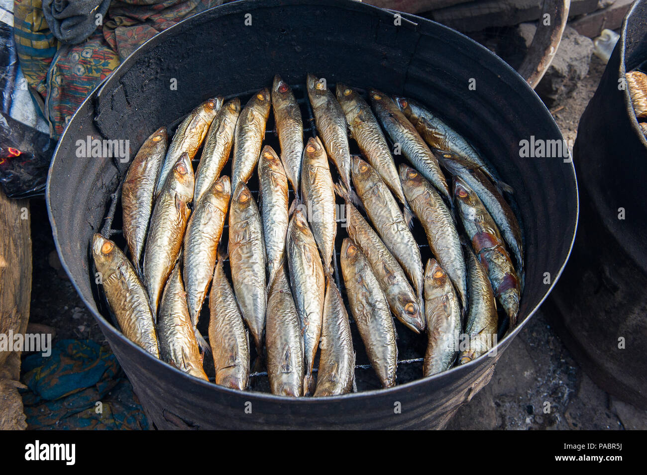 GHANA - MARCH 2, 2012: Fish market in Ghana, on March 2nd, 2012. People ...
