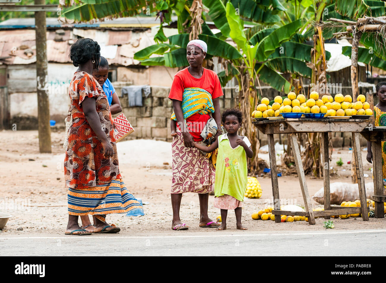 ACCRA, GHANA - MARCH 2, 2012: Unidentified Ghanaian woman with her ...