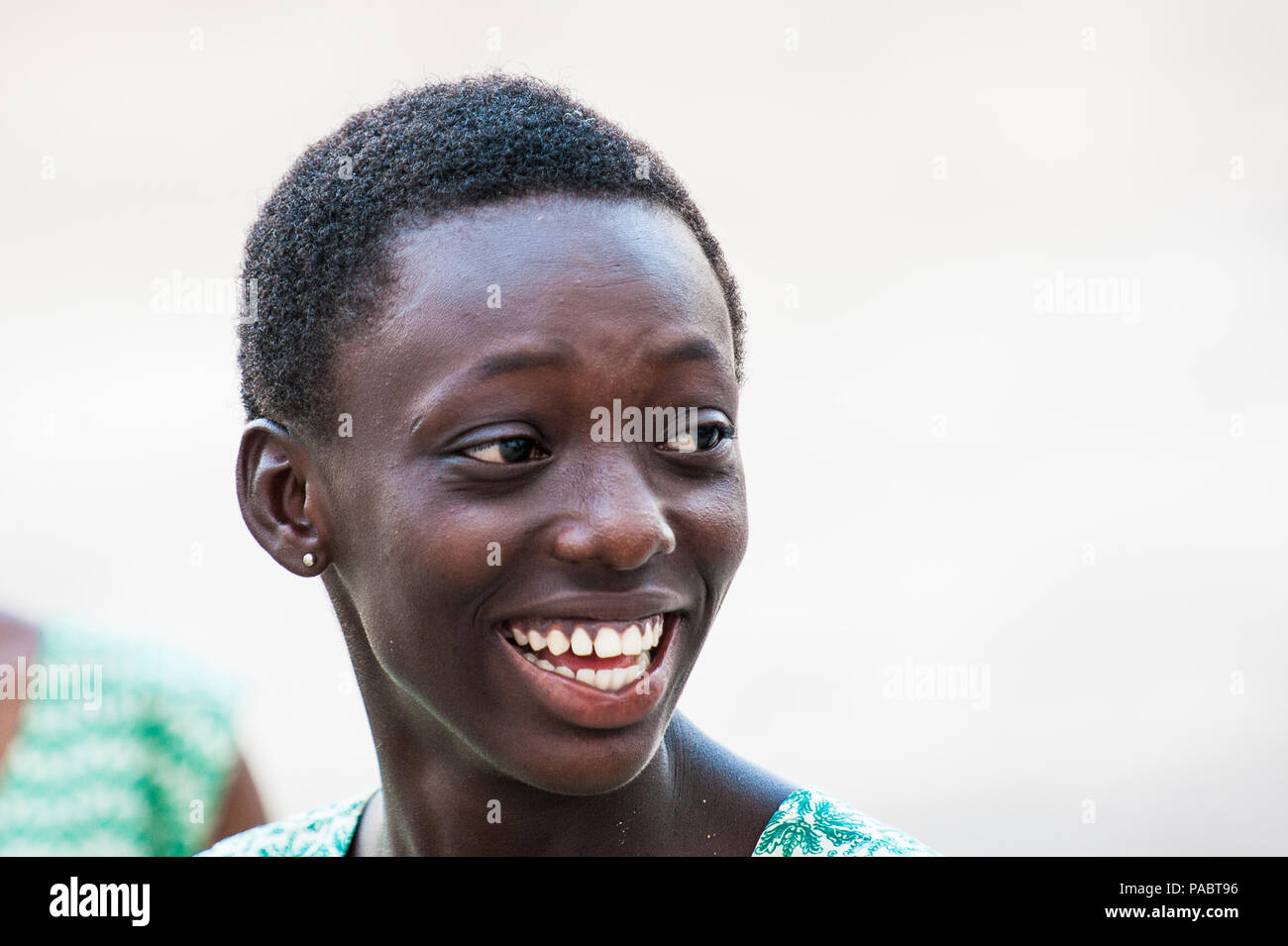 ACCRA, GHANA - MARCH 2, 2012: Unidentified Ghanaian girl smiles. People ...