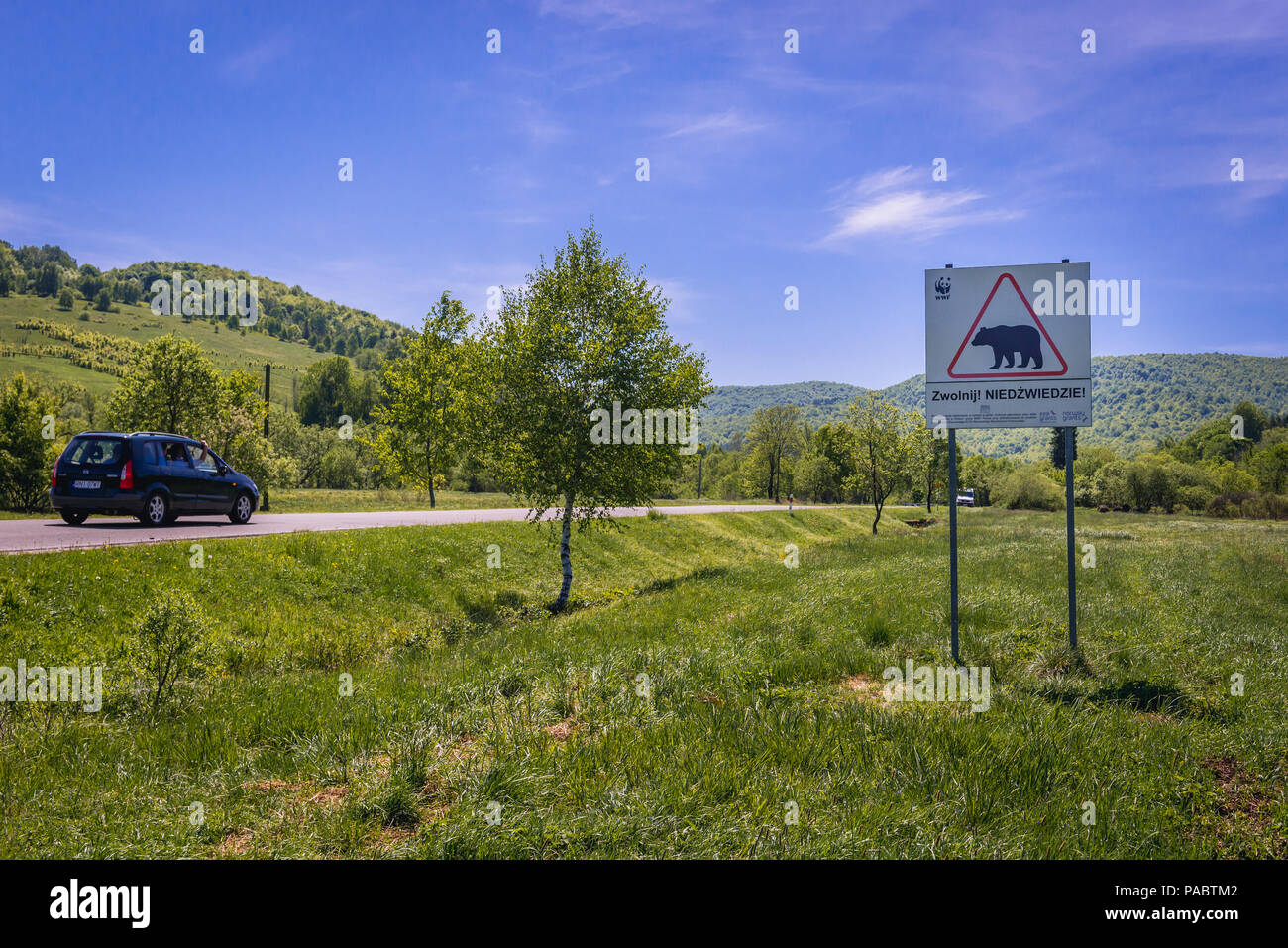 Slow down village road sign hi-res stock photography and images - Alamy