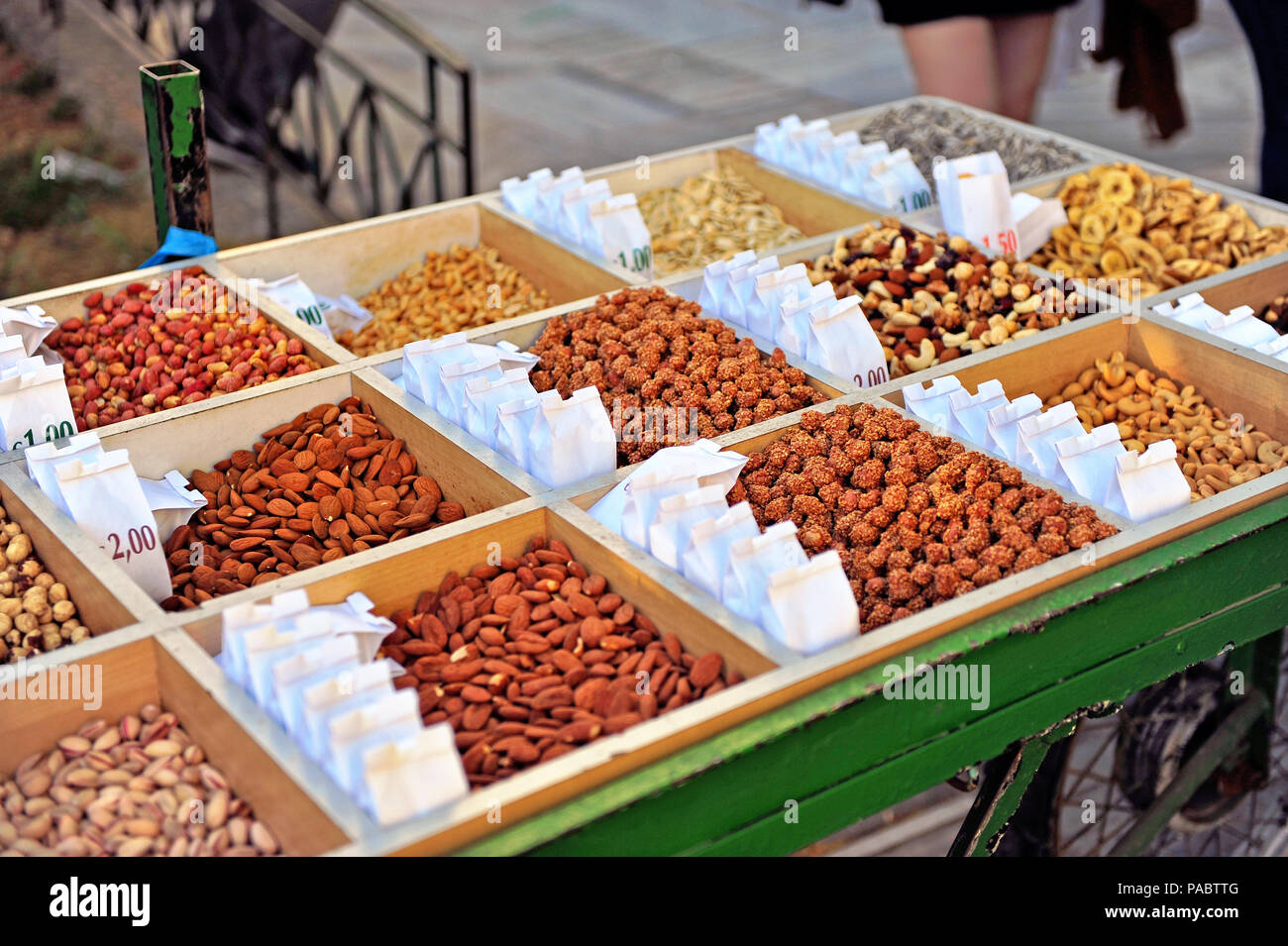 Assortie of nuts with prices, food market stall Stock Photo - Alamy