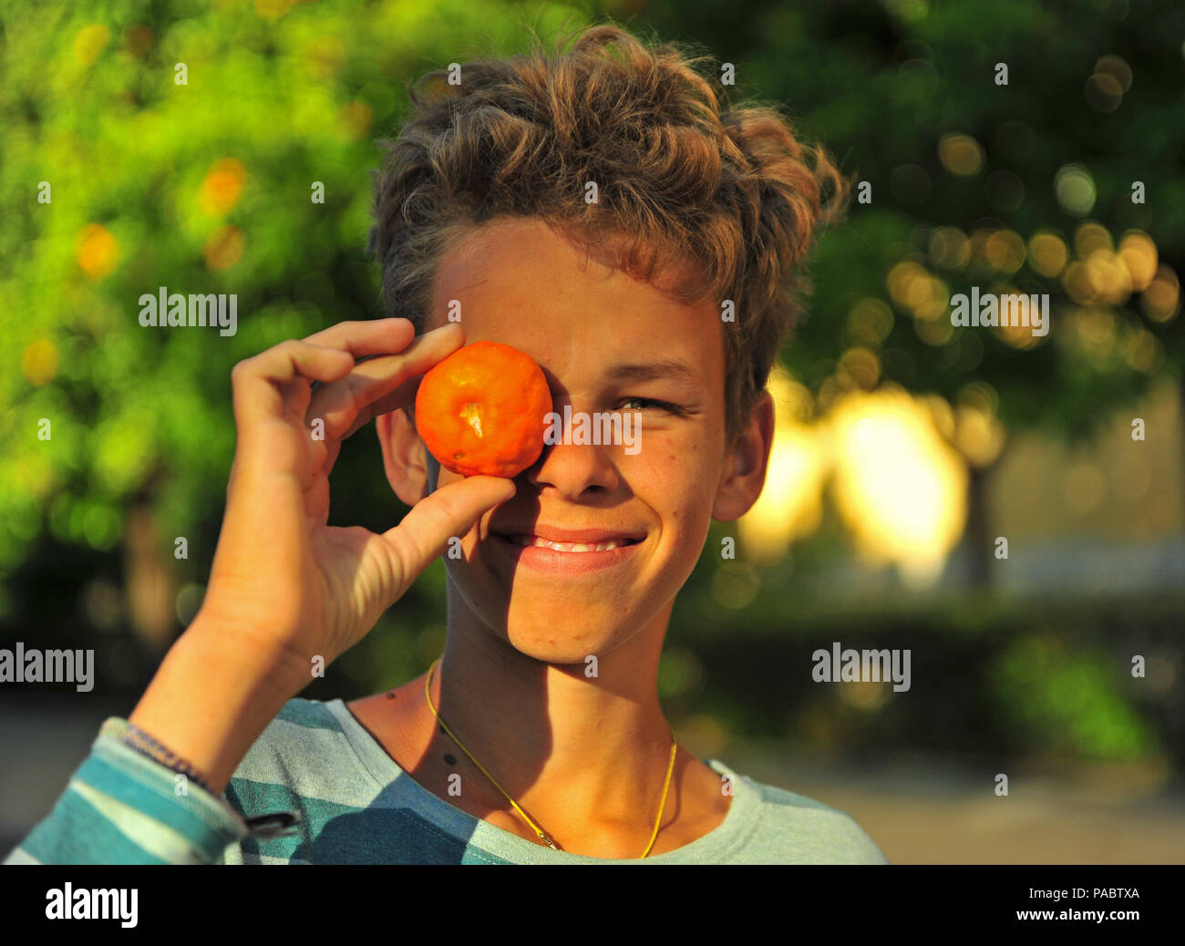 Kid holding light hi-res stock photography and images - Alamy