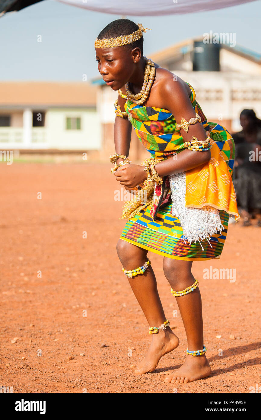 GHANA - MARCH 3, 2012: Ghanaian girl in national colors clothes dances ...