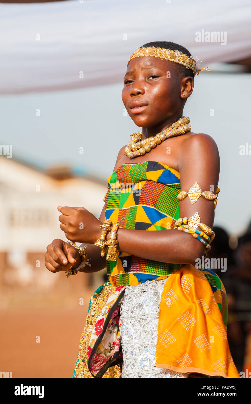 GHANA - MARCH 3, 2012: Ghanaian girl in national colors clothes dances ...