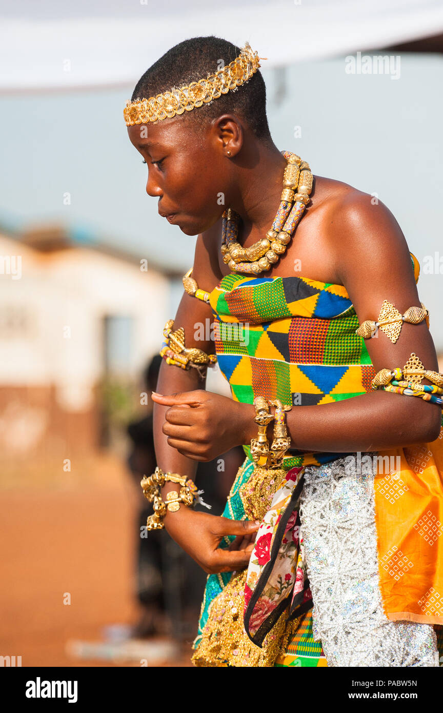 GHANA - MARCH 3, 2012: Ghanaian girl in national colors clothes dances ...