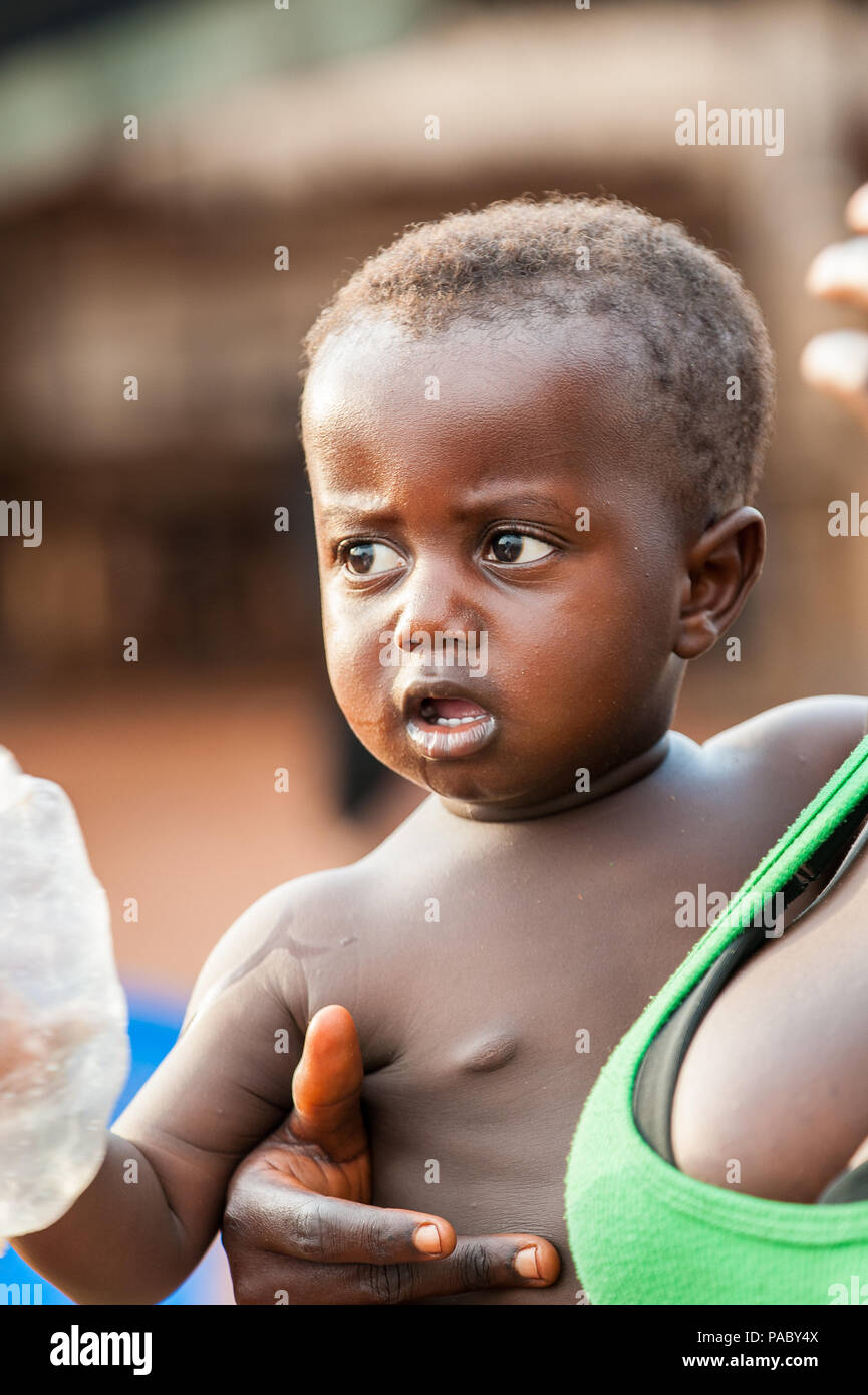 ACCRA, GHANA - MARCH 5, 2012: Unidentified Ghanaian baby boy on his ...