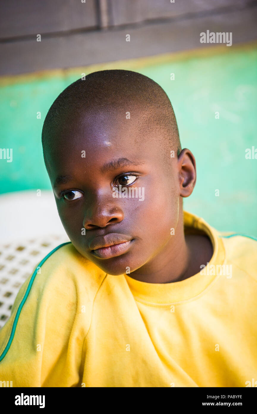 ACCRA, GHANA - MARCH 5, 2012: Unidentified Ghanaian boy in the street ...