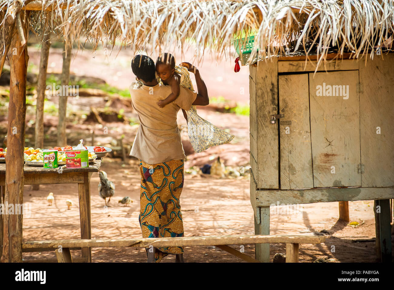 ACCRA, GHANA - MARCH 5, 2012: Unidentified Ghanaian woman carries her ...