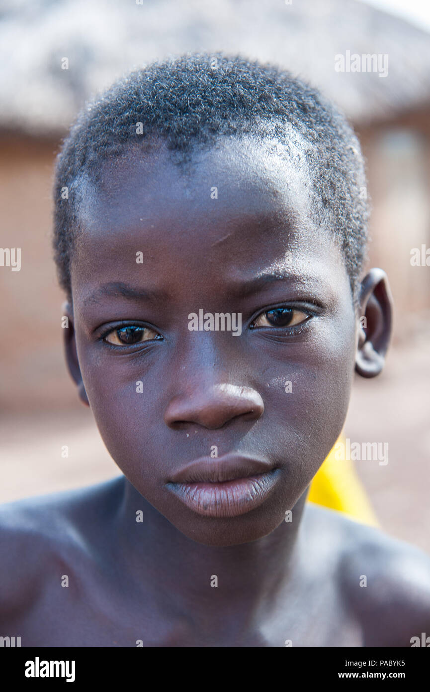 ACCRA, GHANA - MARCH 6, 2012: Unidentified Ghanaian boy in the street ...