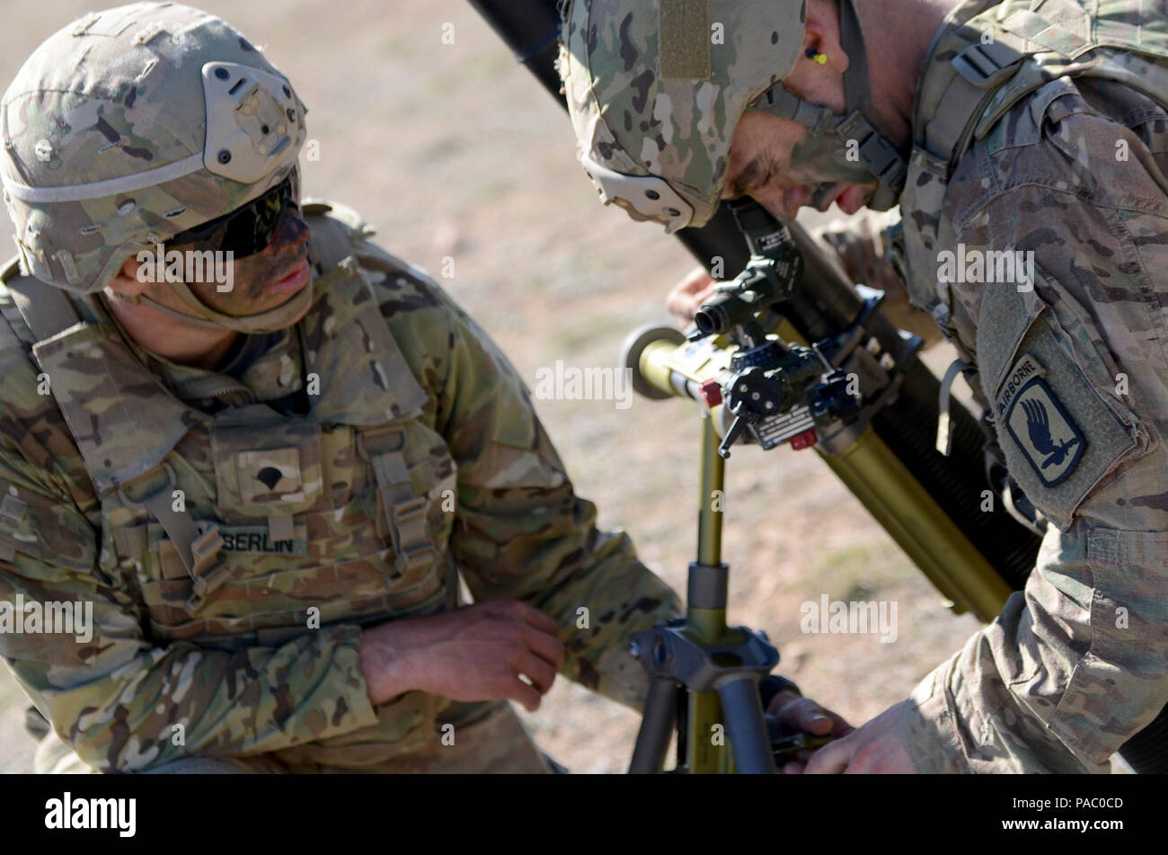 U.S. Army Pfc. Benjamin Mills, right, a mortarman assigned to the 1st ...